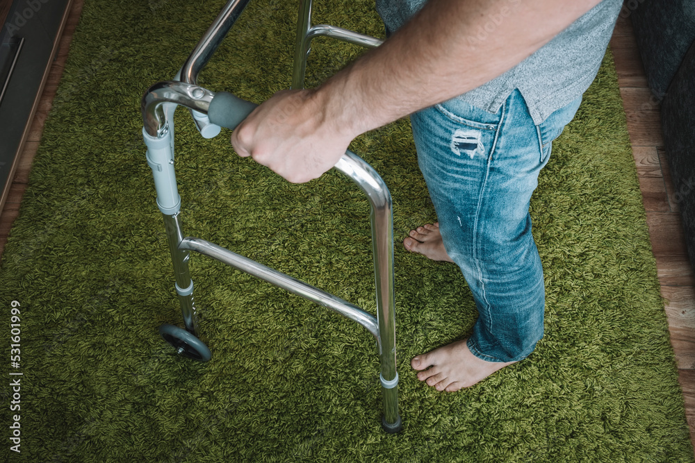 sick person moves with the help of special walkers. Problems with the ...