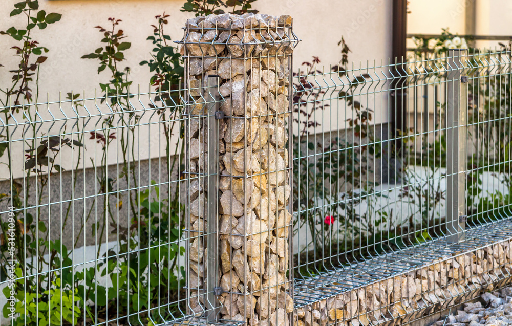 Steel grating fence made with wire with gabions Stock Photo | Adobe Stock