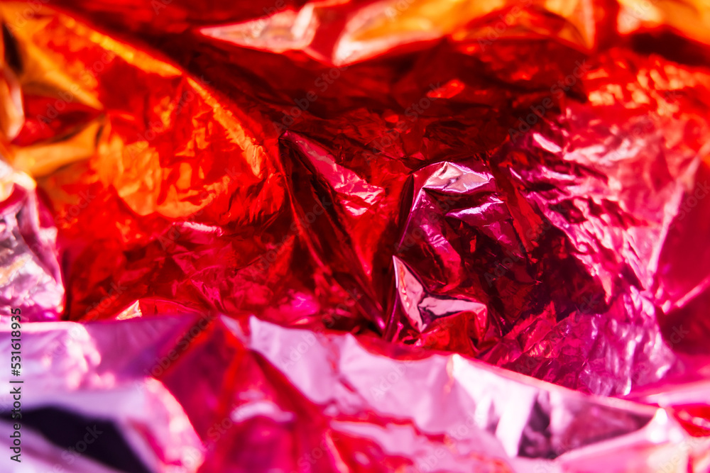 Red foil texture background. Holographic wrinkled surface. Vibrant pink ...