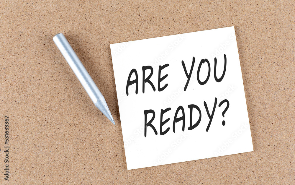 ARE YOU READY text on sticky note on cork board with pencil , Stock ...