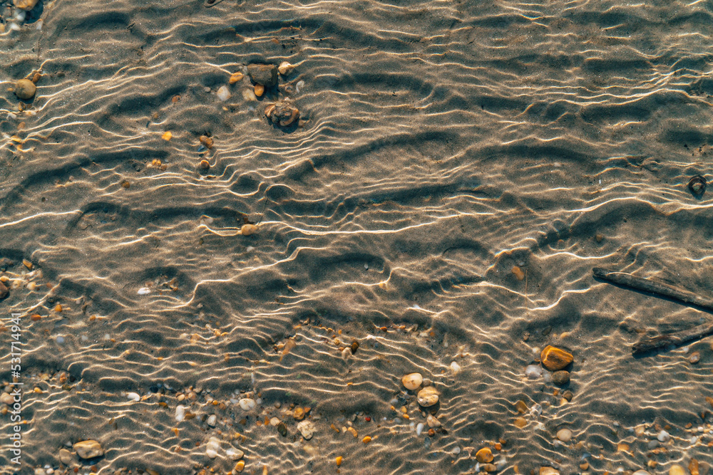 sand and pebbles under water background texture Stock Photo | Adobe Stock