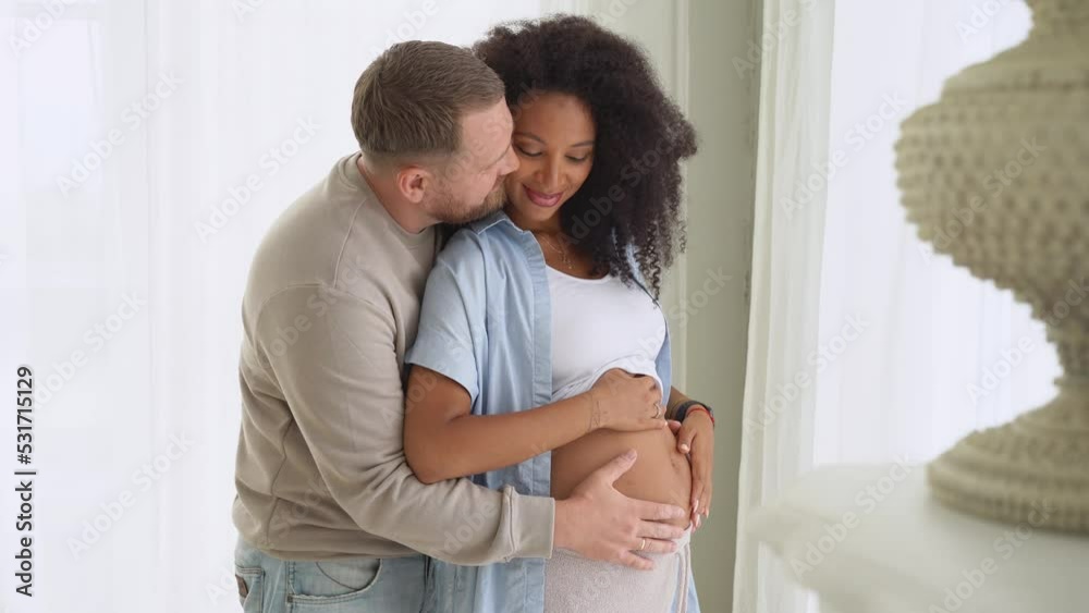 White Man Touching Belly Of His Pregnant Black Wife Pregnant Woman And
