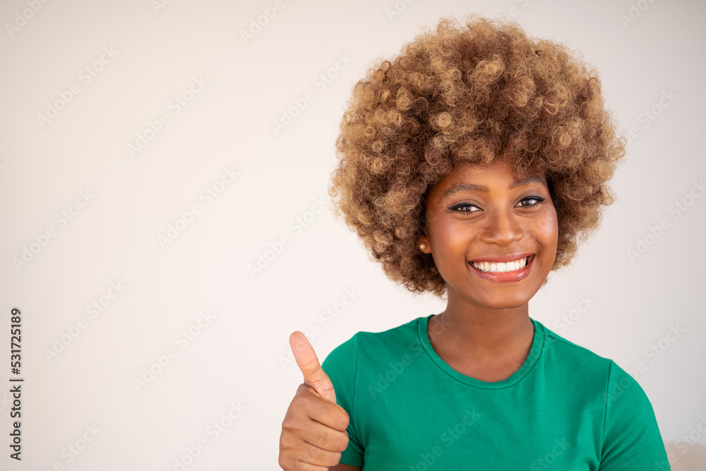 confirmation, approval thumbs up smiling woman in green clothes on ...
