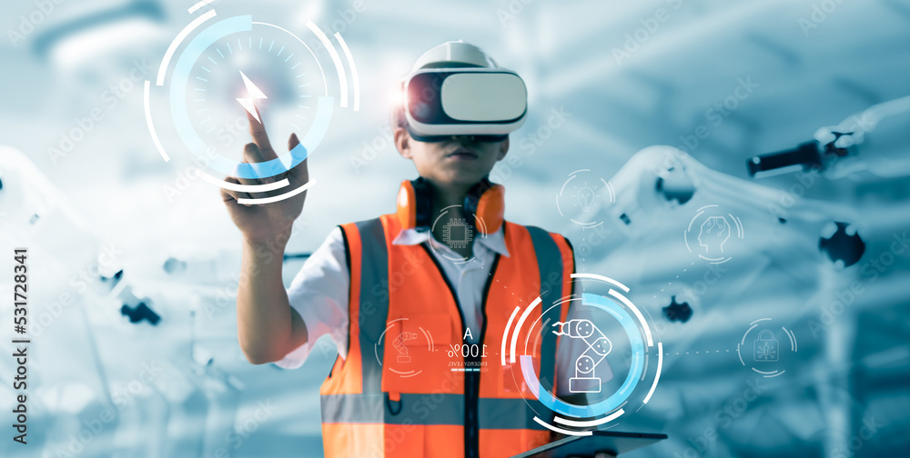 Engineer using virtual reality ui screen interacting with machine ...