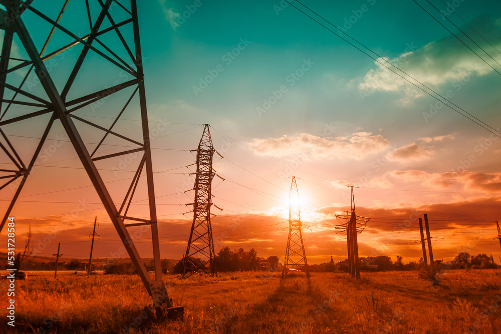 Tower and High Voltage Power Line at sunset. Power line with cloudy ...
