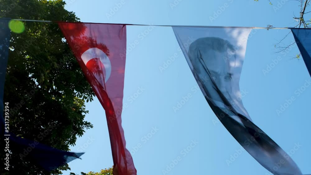 Turkey and Mustafa Kemal Ataturk flag with blue sky in the background ...