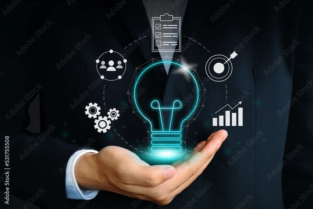 Businessman shows the concept idea of innovation and digital business ...