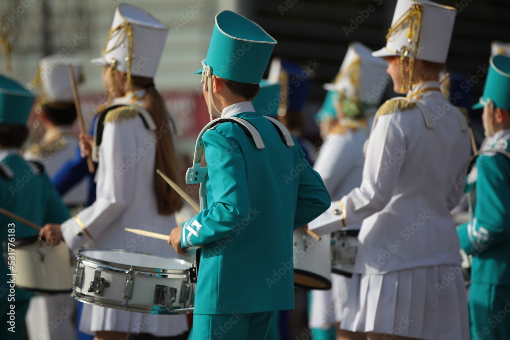 Musicians on parade band of drummers men and women in beautiful ...