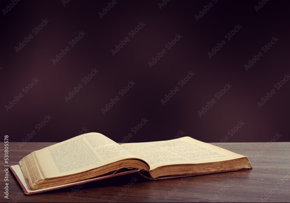 Big open book on a desk for reading concept Stock Photo | Adobe Stock