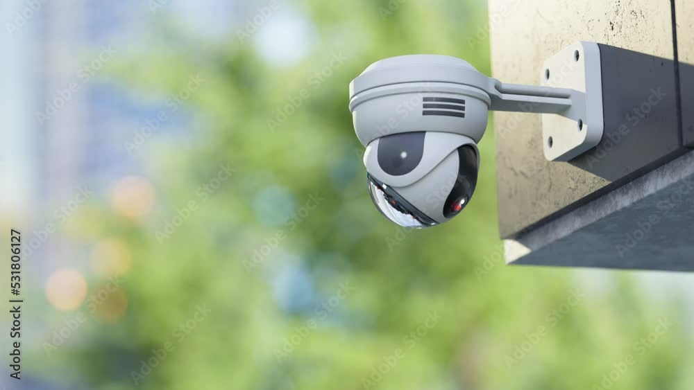 CCTV camera installed on wall of the building. controlled in all ...