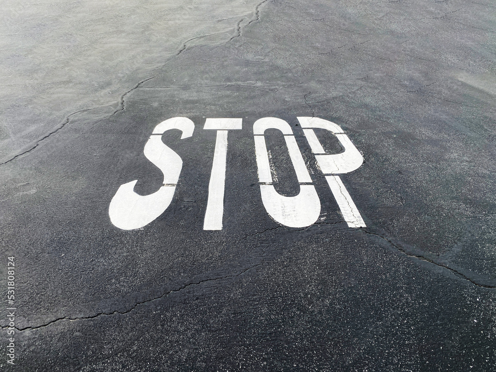 paved road asphalt stop sign painted roadway intersection warning ...