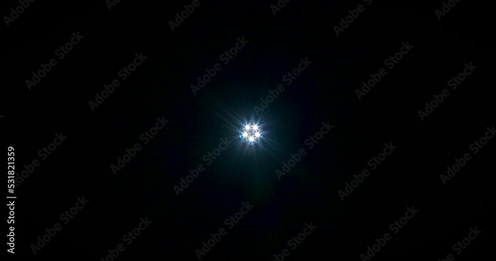 UFO light beams and rays movement against black background spacecraft ...