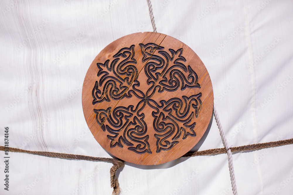 Carved wooden patterns of Asia. National traditional decoration of yurt ...