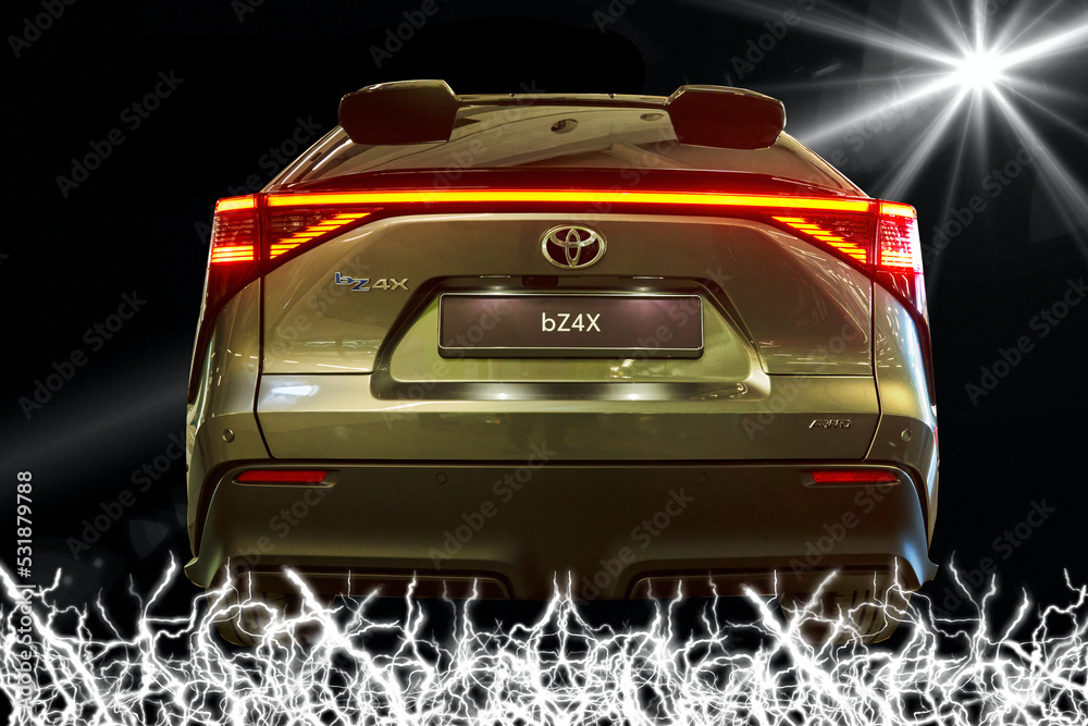 Toyota bz4X all-electric SUV in the rear view, concept with lightning ...