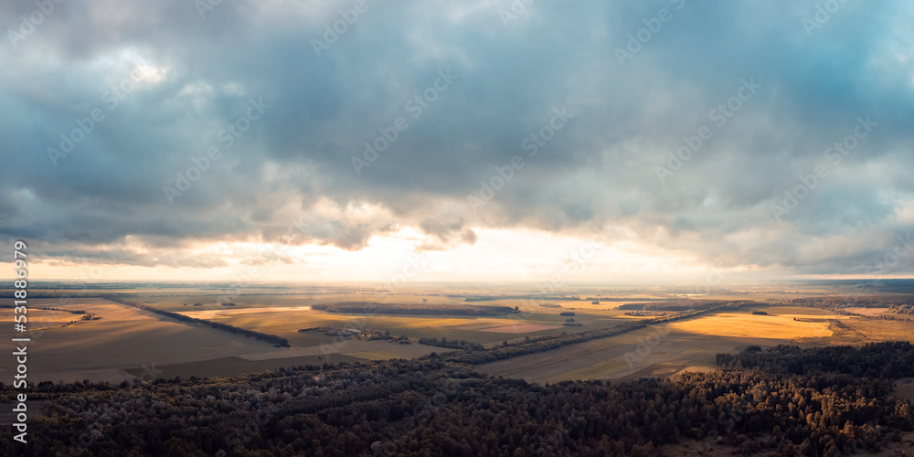 Aerial view of countryside with some agricultural land, forests, road ...