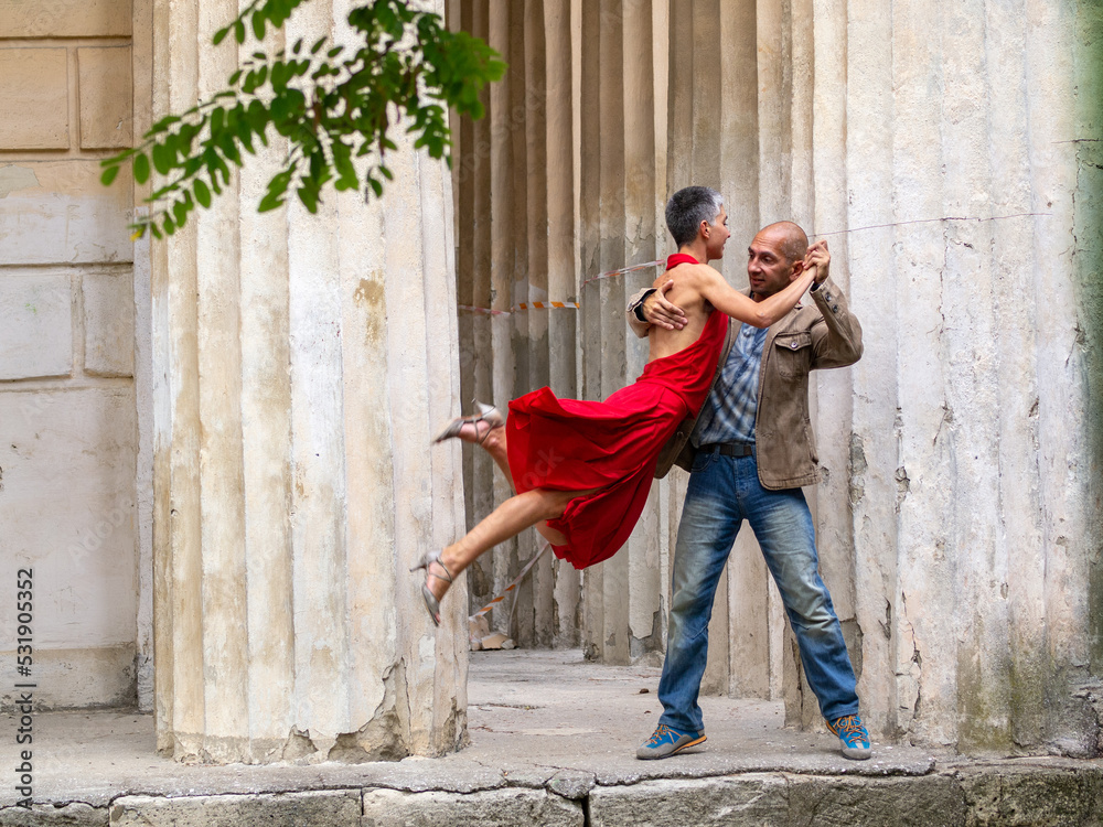 Tango nuevo dance - the famous partner dance with a woman in a red ...