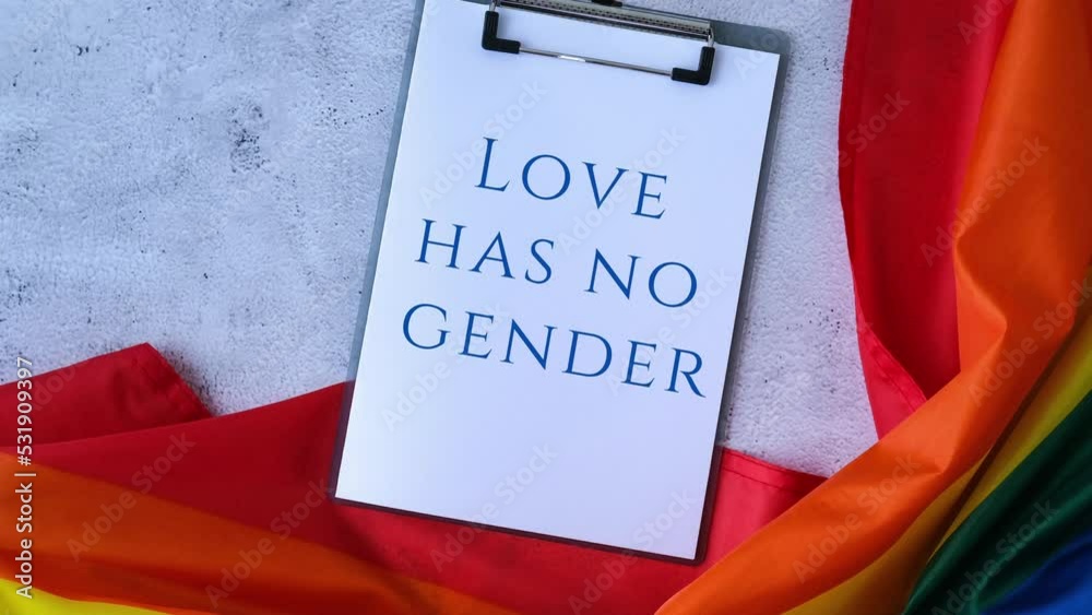 4k zoom in out Rainbow flag with text LOVE HAS NO GENDER message paper ...