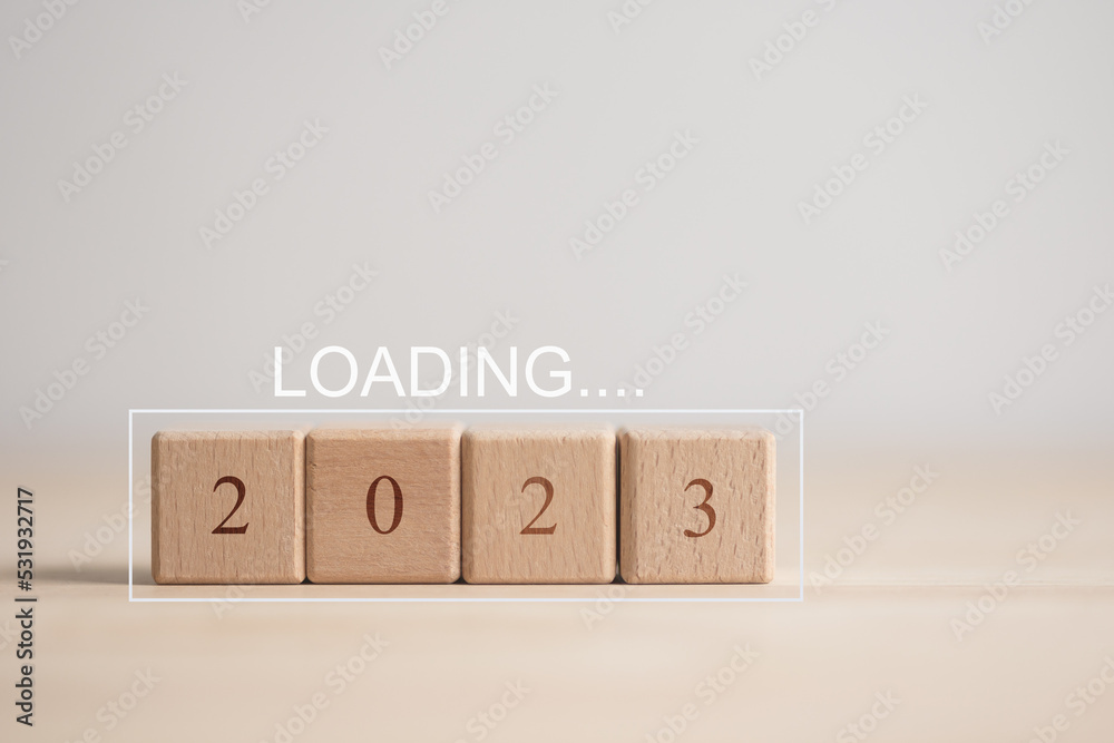 2023 New year loading concept. Wooden cube block with text 2023 on ...