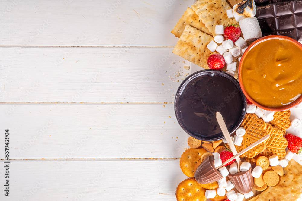 S'mores home party food and ingredients. Smores buffet background with ...