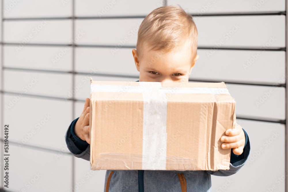 Parcel delivery, pickup point with lockers, kid with parcel ...