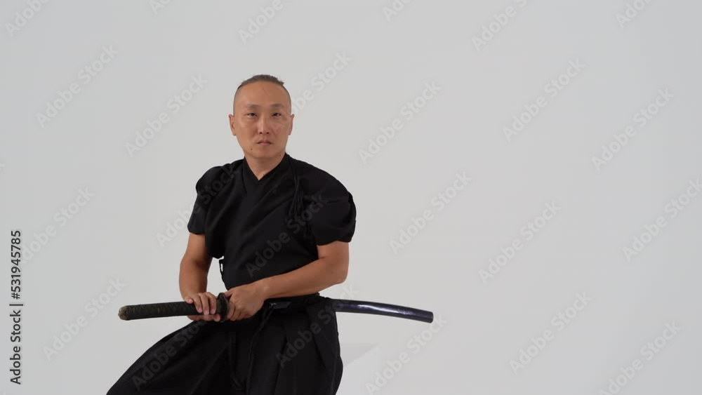 Japanese man traditional dress, black kimano katana samurai sword ...