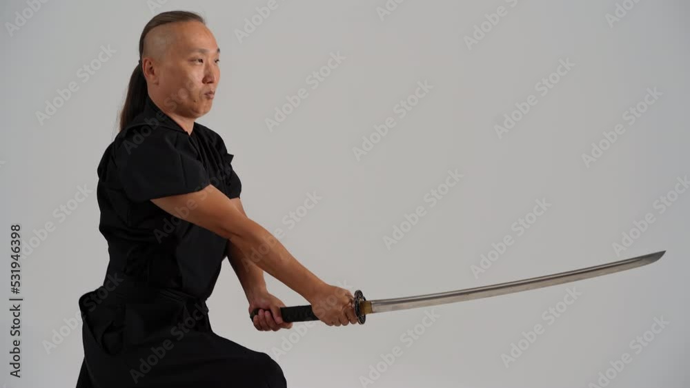Japanese man traditional dress, black kimano katana samurai sword ...