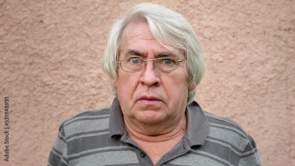 Closeup portrait of old man, grandfather afraid and shocked with ...