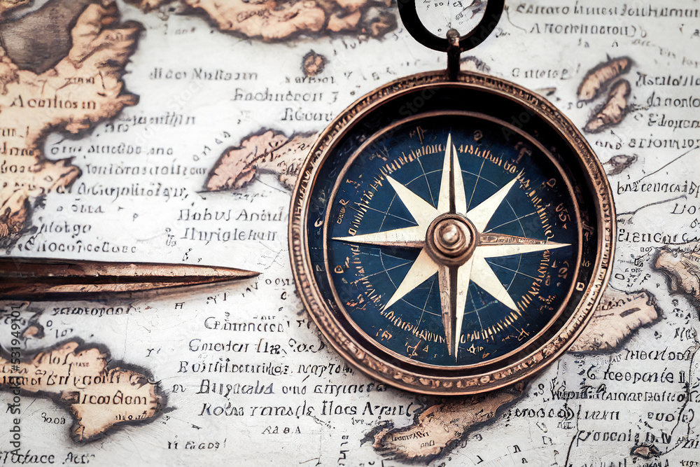 Nice vintage navigation compass seen from above on an old geographical ...