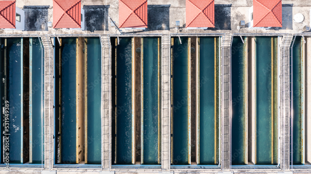 Aerial top view wastewate water treatment plant, Purification tanks of ...