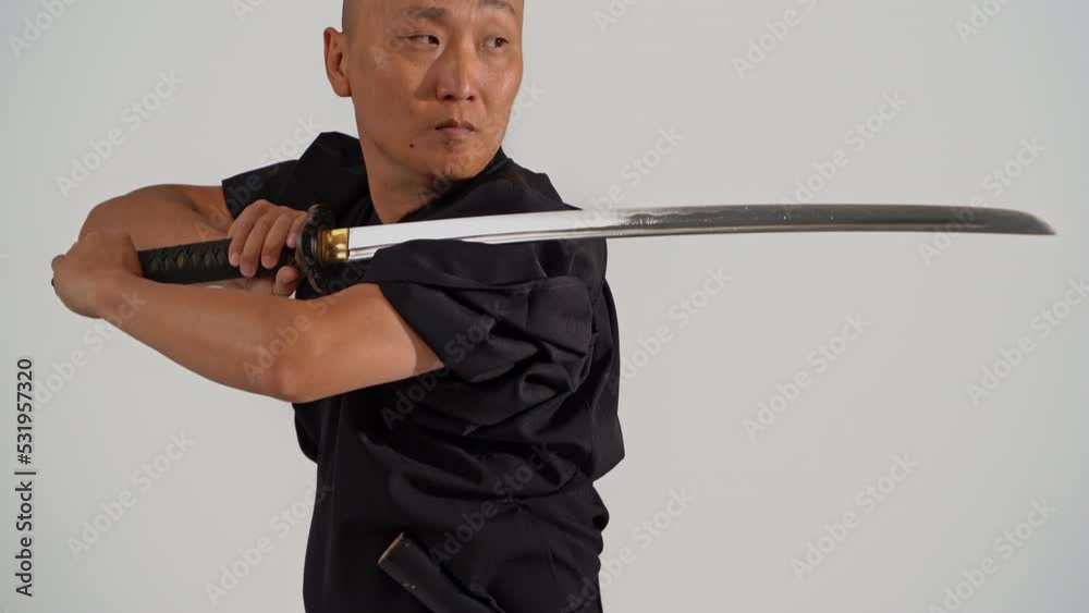 Japanese man traditional dress, black kimano katana samurai sword ...