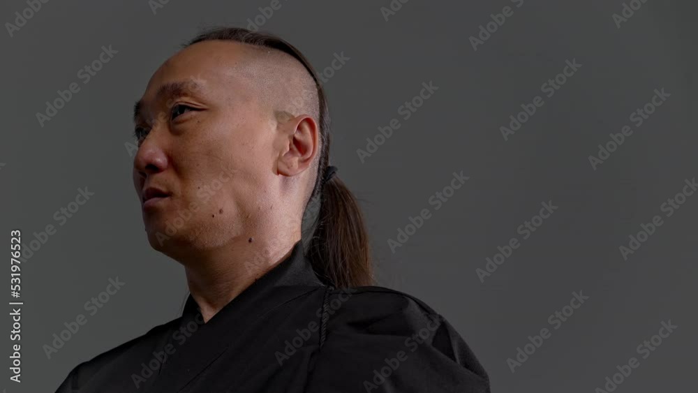 Japanese man traditional dress, black kimano katana samurai sword ...