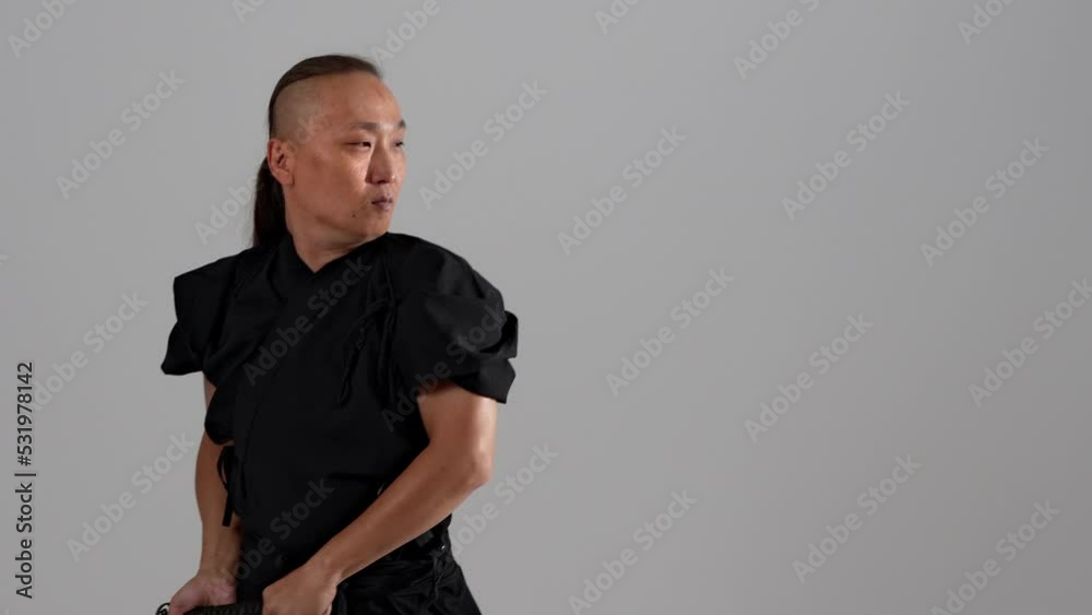 Japanese man traditional dress, black kimano katana samurai sword ...
