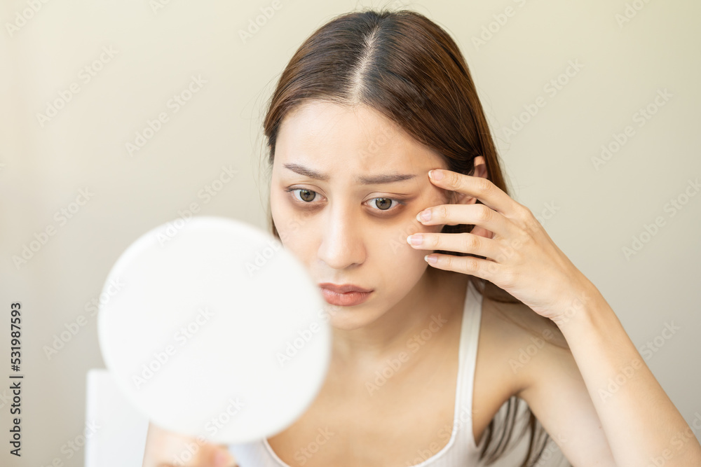 Bored, insomnia asian young woman, girl looking at mirror hand touching ...