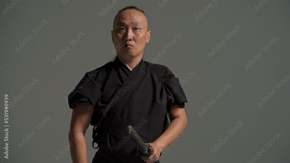 Japanese man traditional dress, black kimano katana samurai sword ...