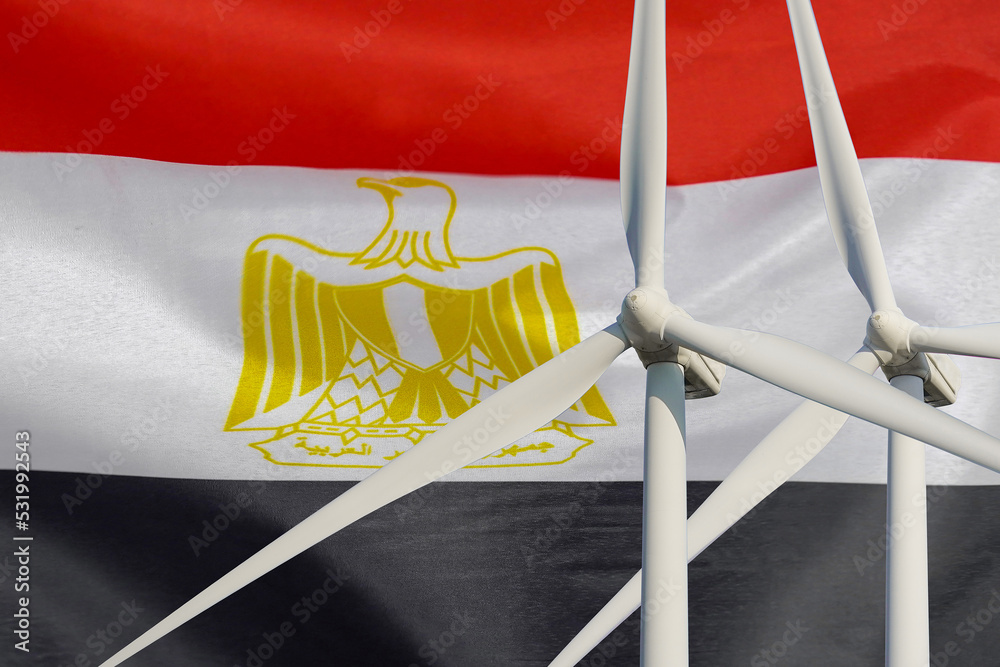 Two Wind Turbines for alternative energy on Egypt flag background ...