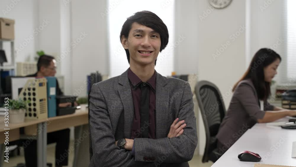 half length portrait of smiling asian male manger wearing business suit ...