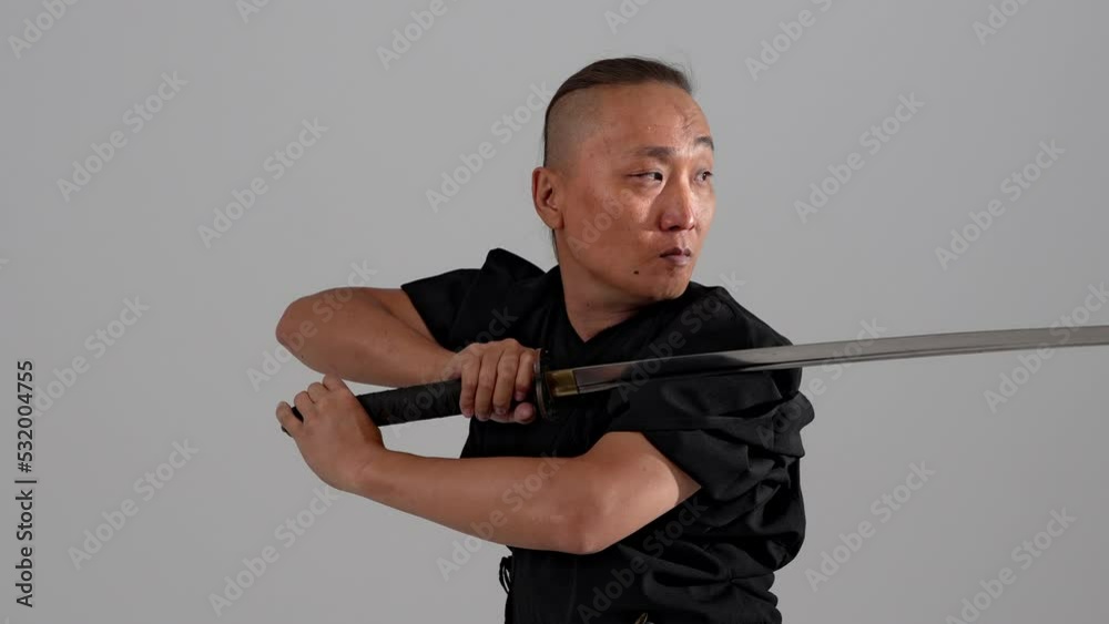 Japanese man traditional dress, black kimano katana samurai sword ...