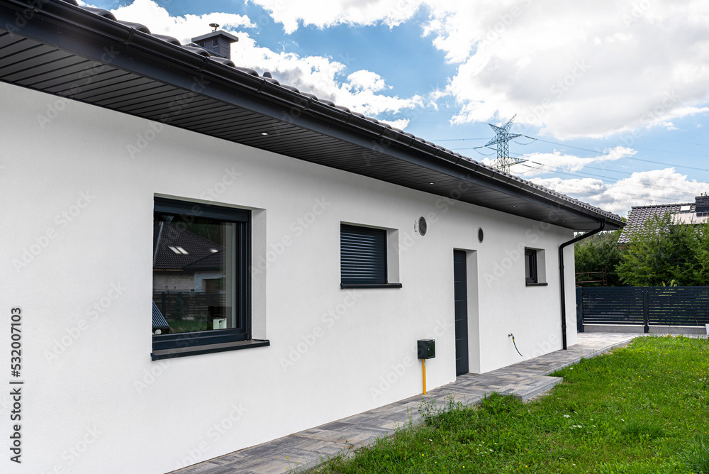 Air intake and exhaust in the wall of a single family house for ...
