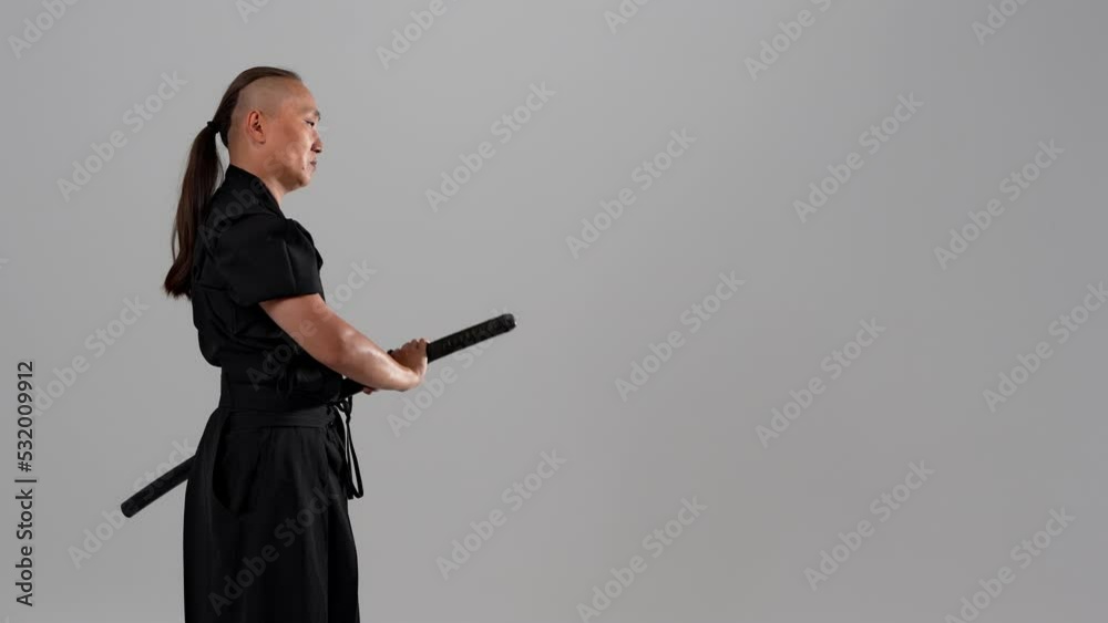 Japanese man traditional dress, black kimano katana samurai sword ...