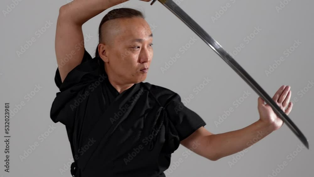 Japanese man traditional dress, black kimano katana samurai sword ...