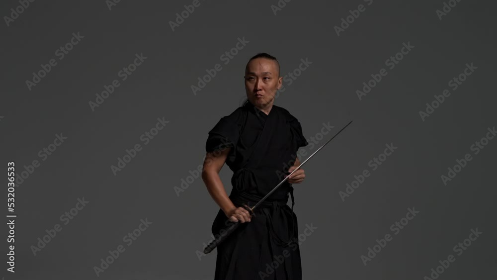 Japanese man traditional dress, black kimano katana samurai sword ...