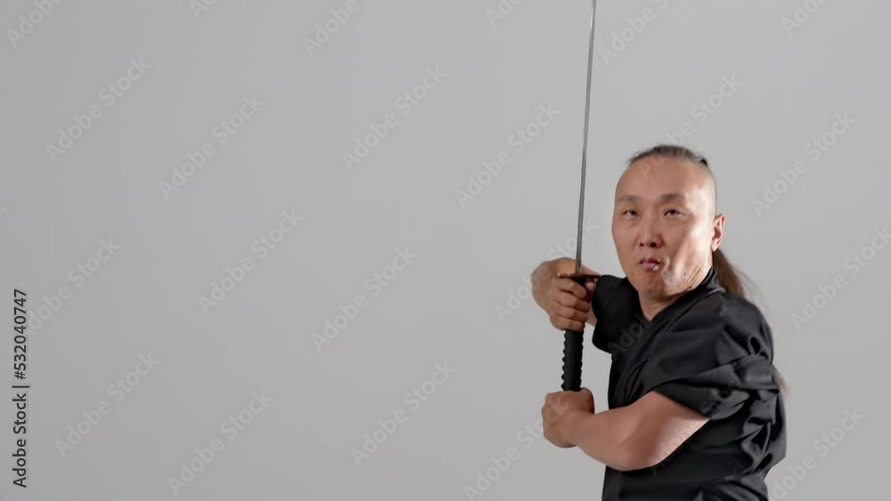 Japanese man traditional dress, black kimano katana samurai sword ...