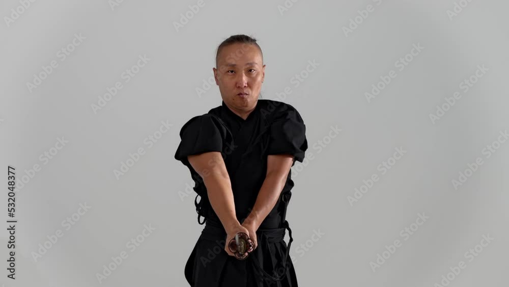 Japanese man traditional dress, black kimano katana samurai sword ...