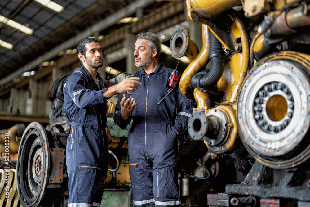 In heavy industry maintenance engineer checking work at site planning ...