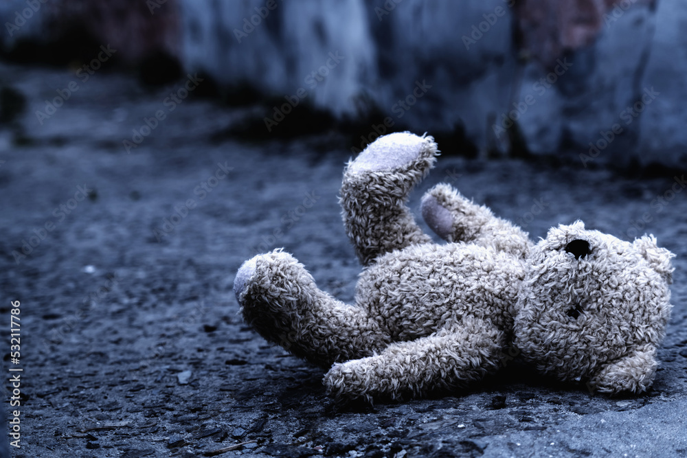 Teddy bear toy forgotten on the street as symbol of children's ...