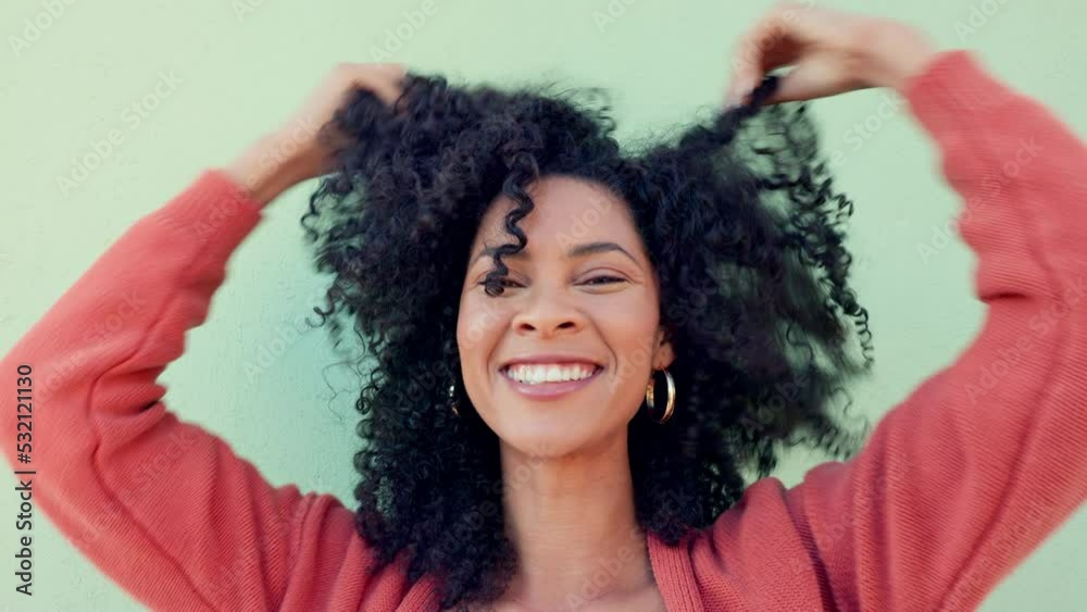 Freedom, hair and fun with a young woman playing with her curly ...