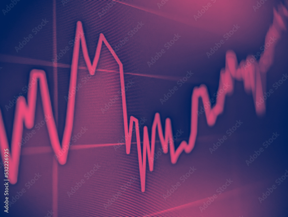 Stock market financial price chart with blue line graph displayed on a ...