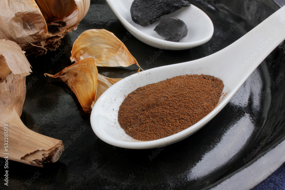 Black garlic made by fermenting process. Fermented foods. Healthy food ...