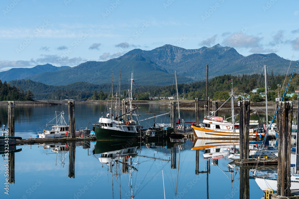 Reflections in the habor in Queen Charlotte City on Hadai Gwaii island ...