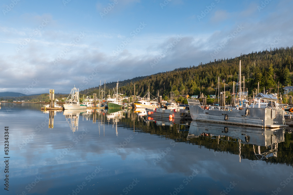 Reflections in the habor in Queen Charlotte City on Hadai Gwaii island ...